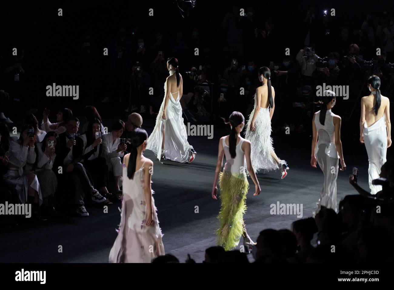SHANGHAI, CHINA - MARCH 28, 2023 - Models walk show during the COMME ...