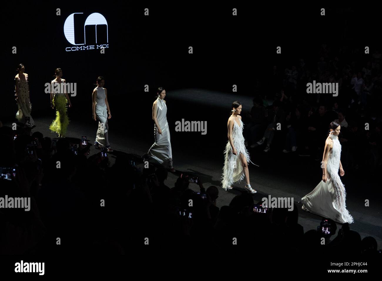 SHANGHAI, CHINA - MARCH 28, 2023 - Models walk show during the COMME ...
