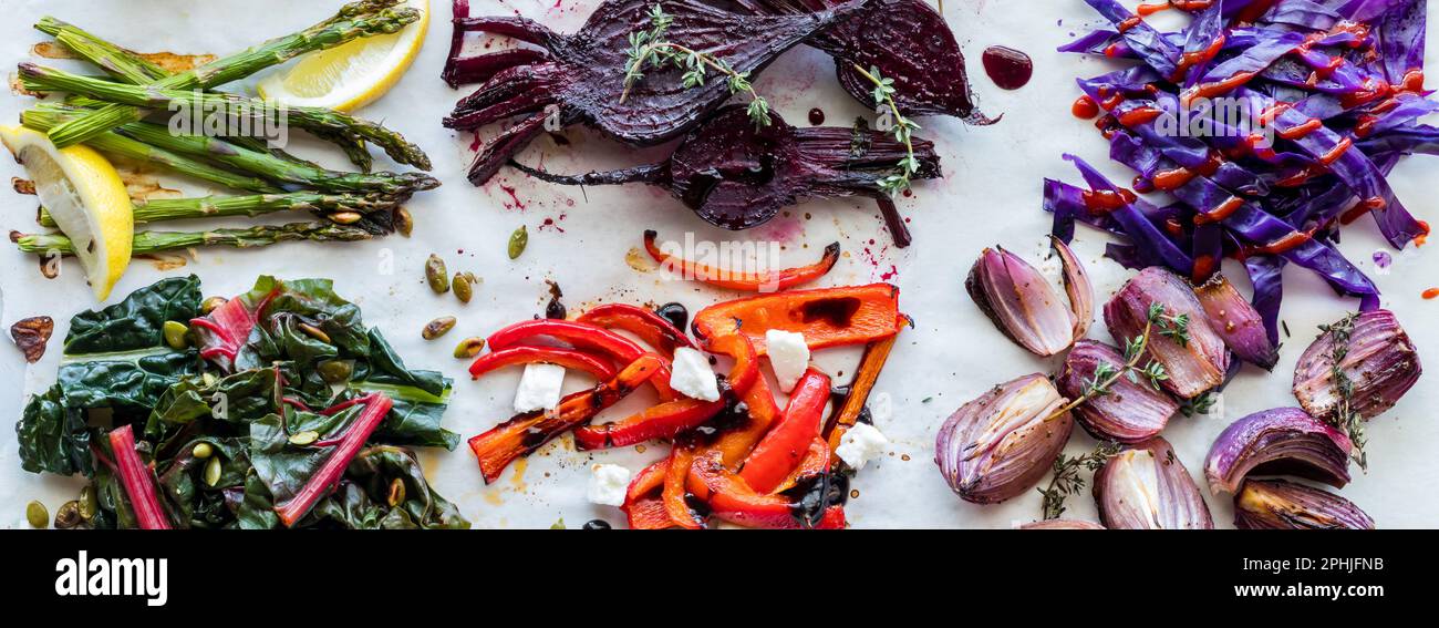 Narrow view of messy groups of steamed, sauteed and roasted vegetables ...