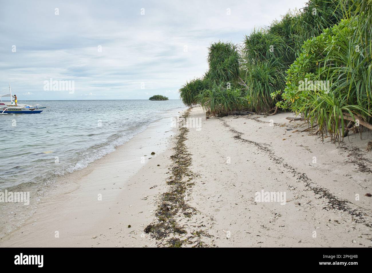 Idyllic, secluded beach on Pamilacan Island in the Philippines with ...