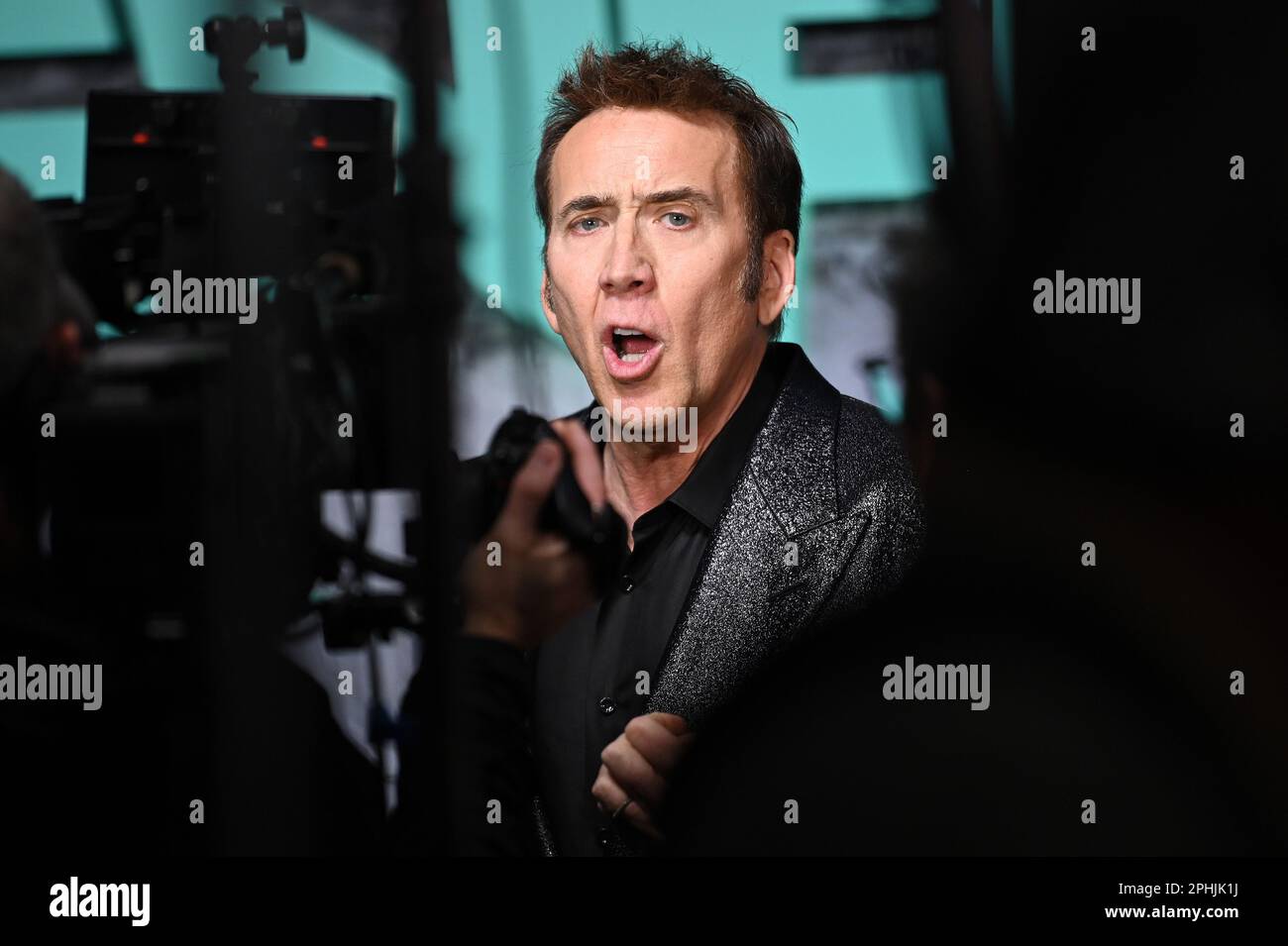 New York, USA. 28th Mar, 2023. Nicholas Cage walks the red carpet at ...