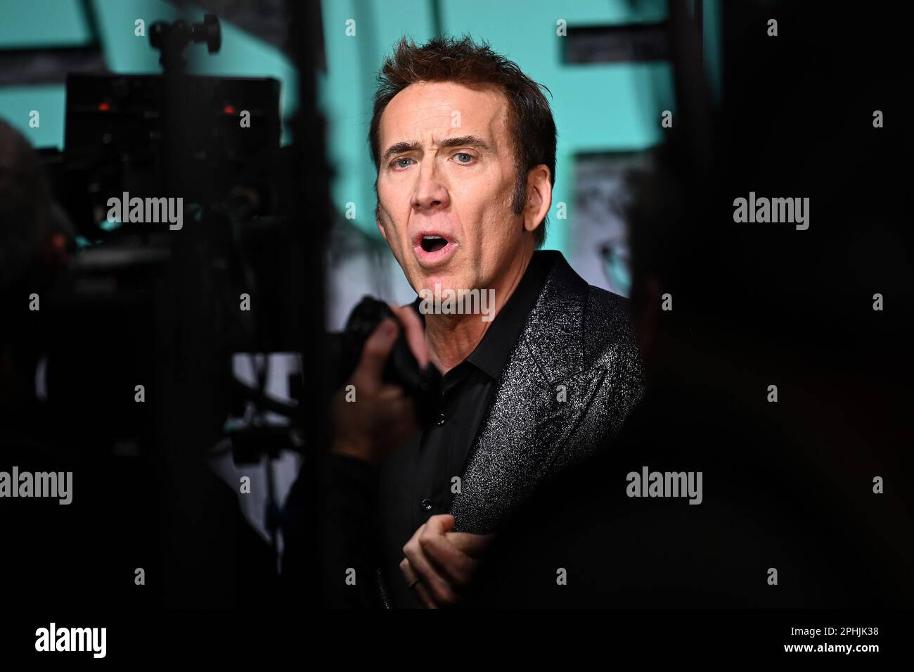 New York, USA. 28th Mar, 2023. Nicholas Cage walks the red carpet at ...