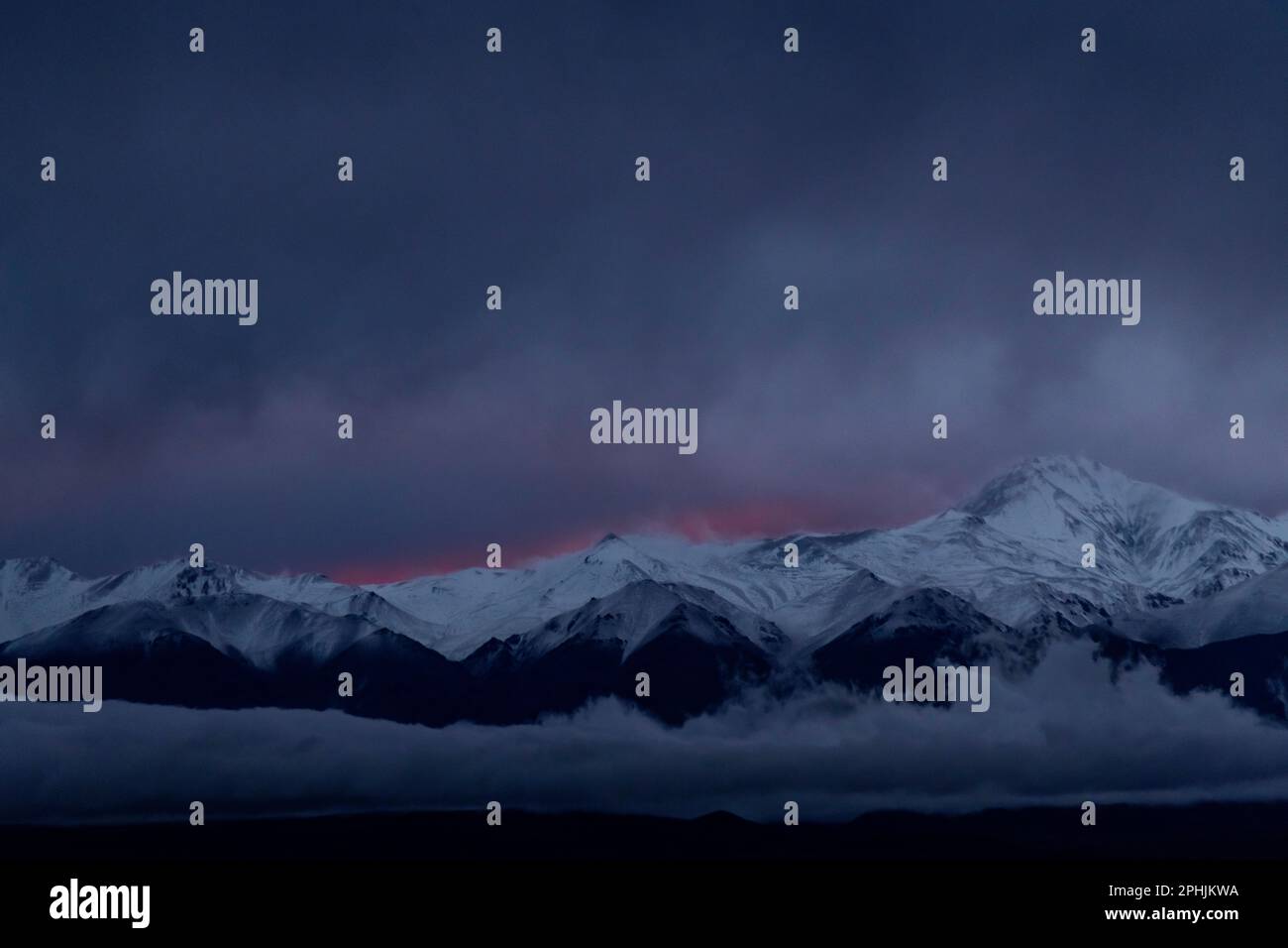 The sun setting behind the mighty Andes Mountains as seen from the Ruta ...