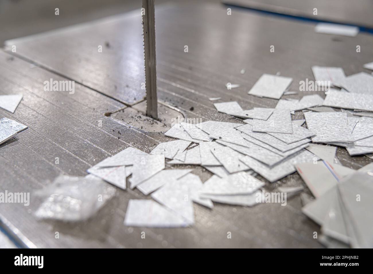 machine blade with cut scrap metal Stock Photo - Alamy