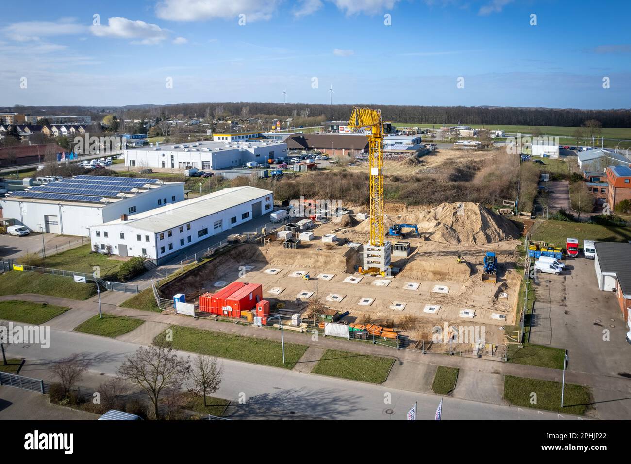 on a construction site large foundations are poured for the pillars of ...