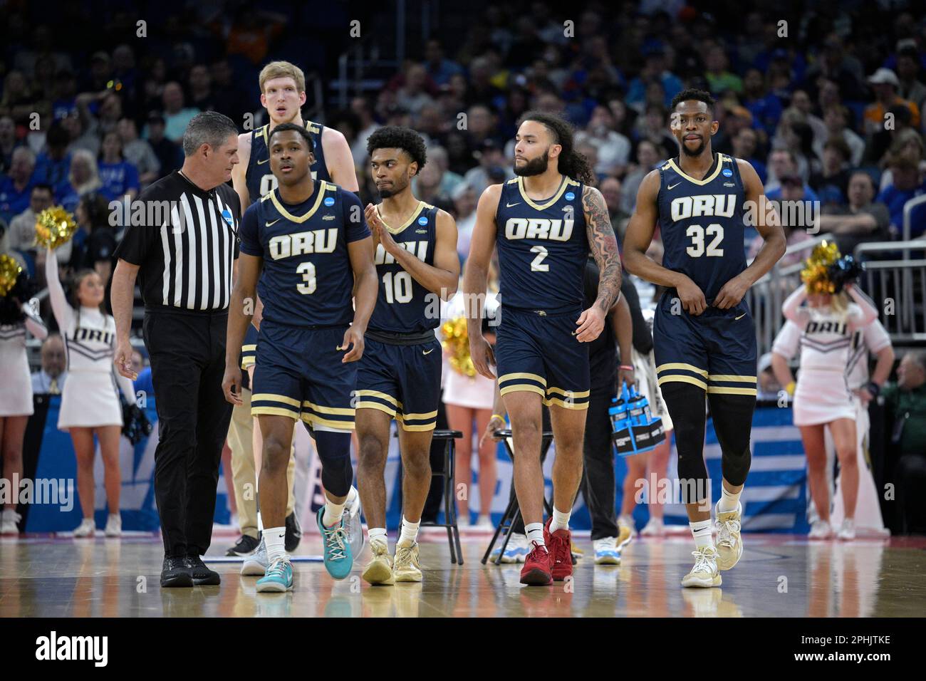 Oral Roberts forward Connor Vanover, rear, guard Max Abmas (3), guard ...