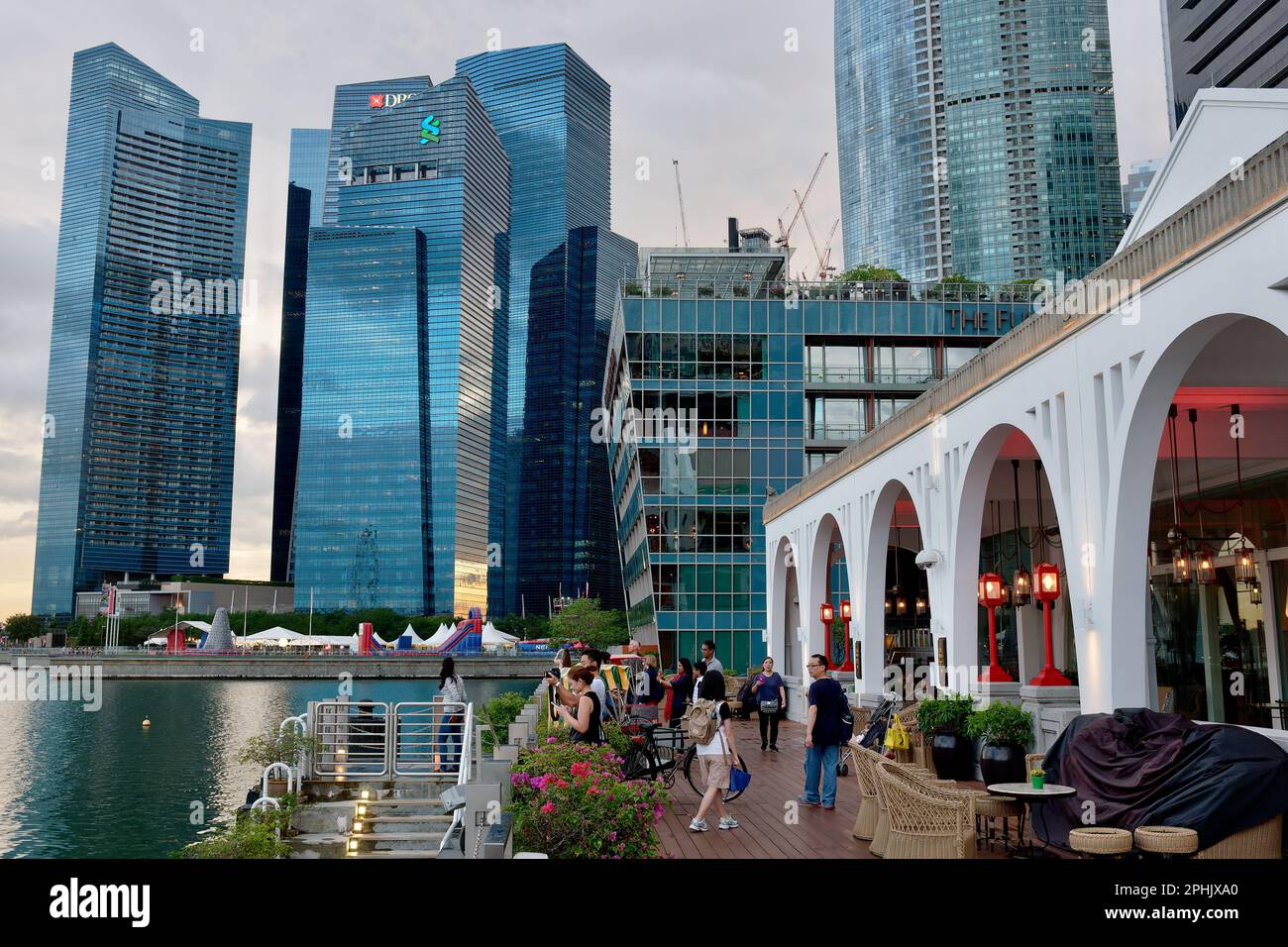 Evening view from the northern side of Marina Bay, Singapore, high rise ...