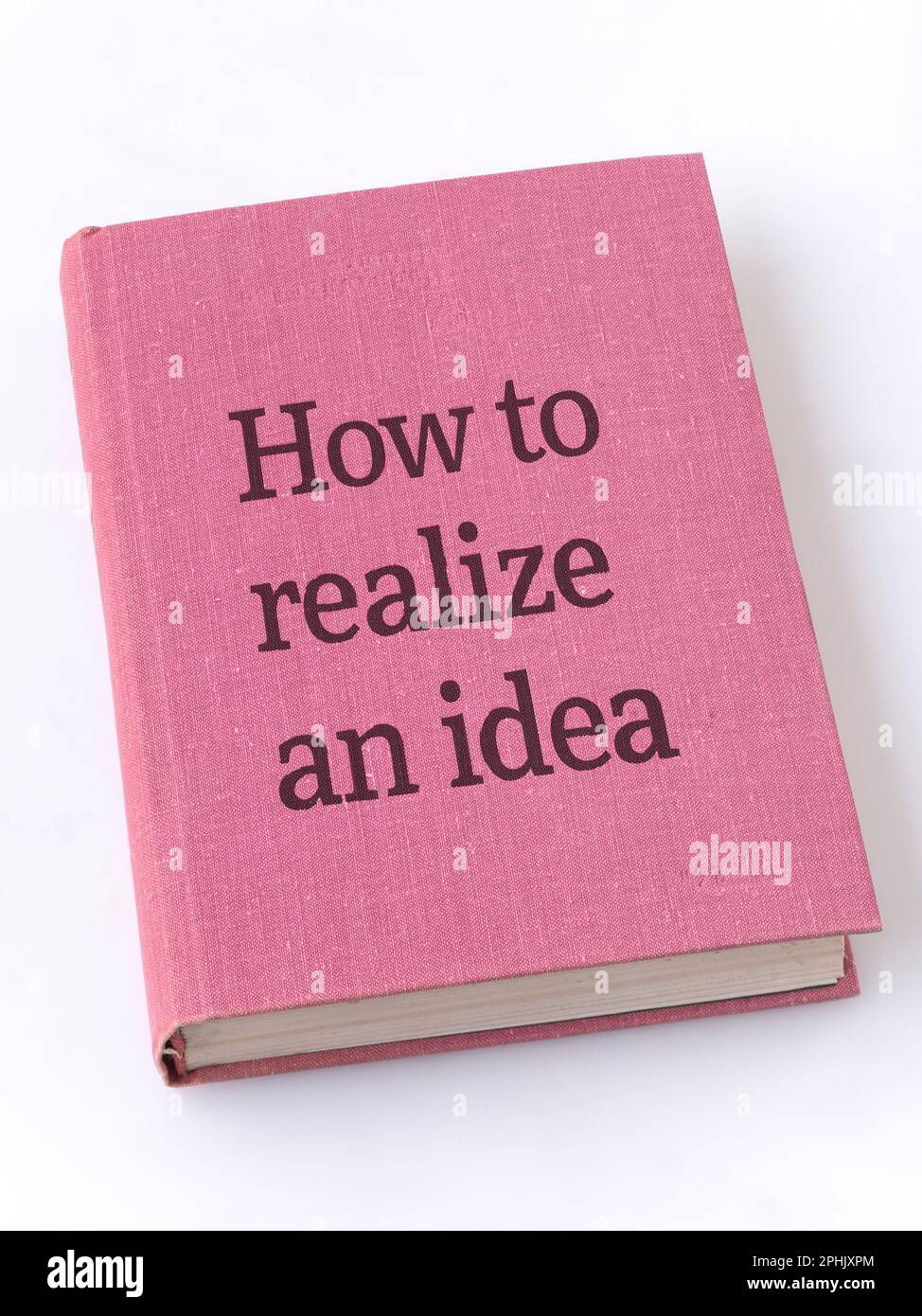 how to realize an idea phrase printed on textile book cover Stock Photo ...