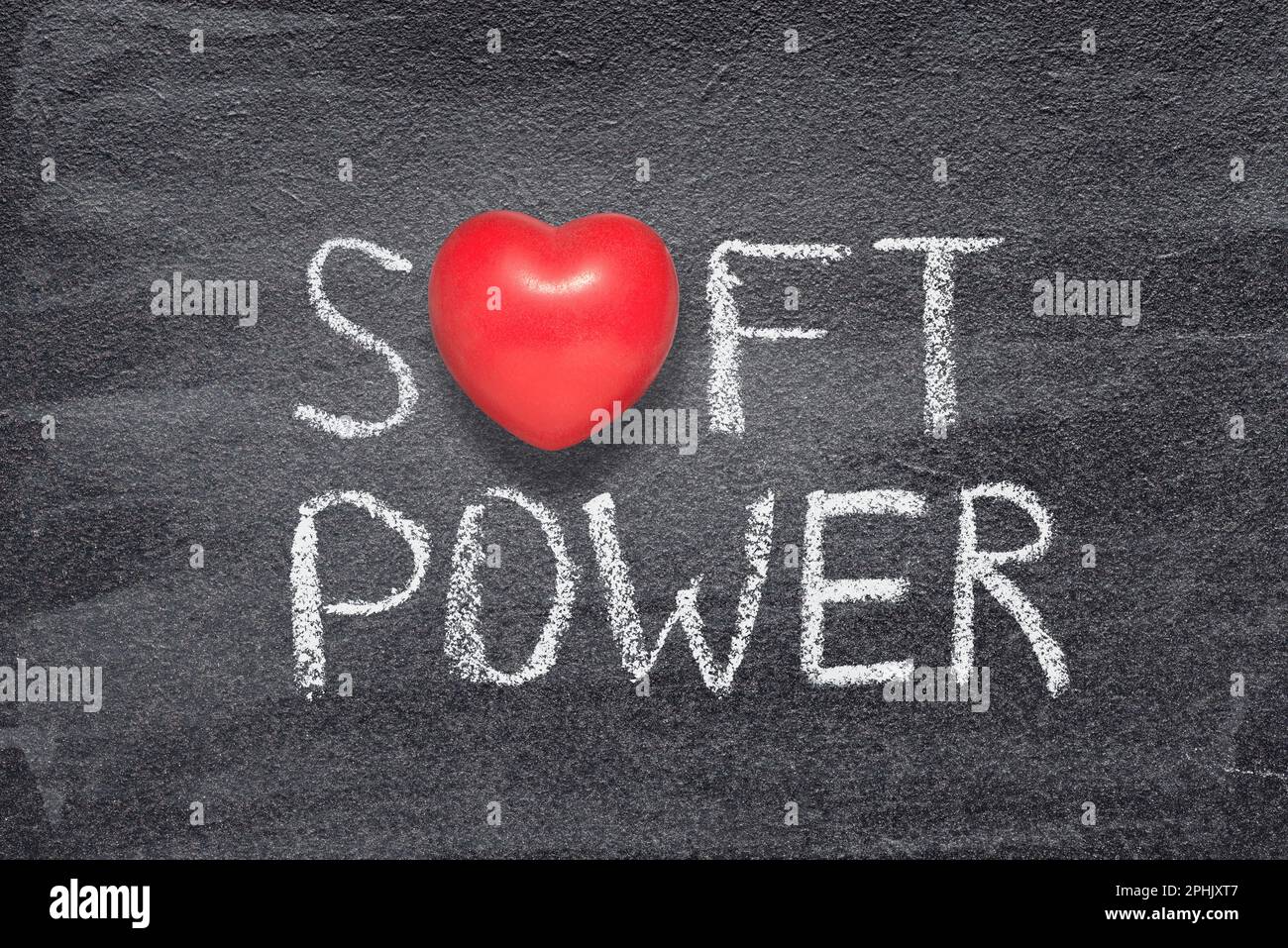 soft power phrase written on chalkboard with red heart symbol instead ...