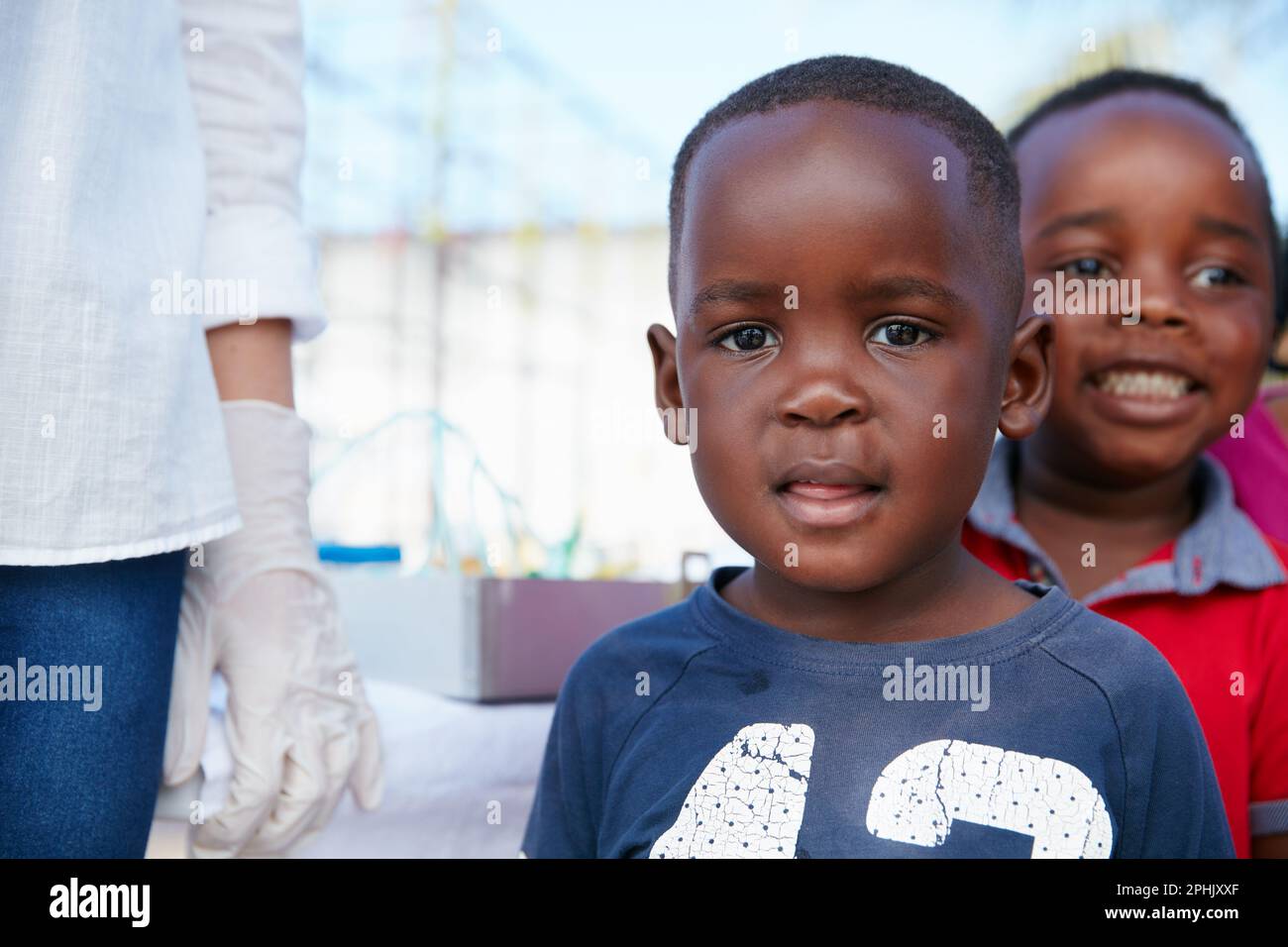 Too cute for words. kids at a community outreach event Stock Photo - Alamy