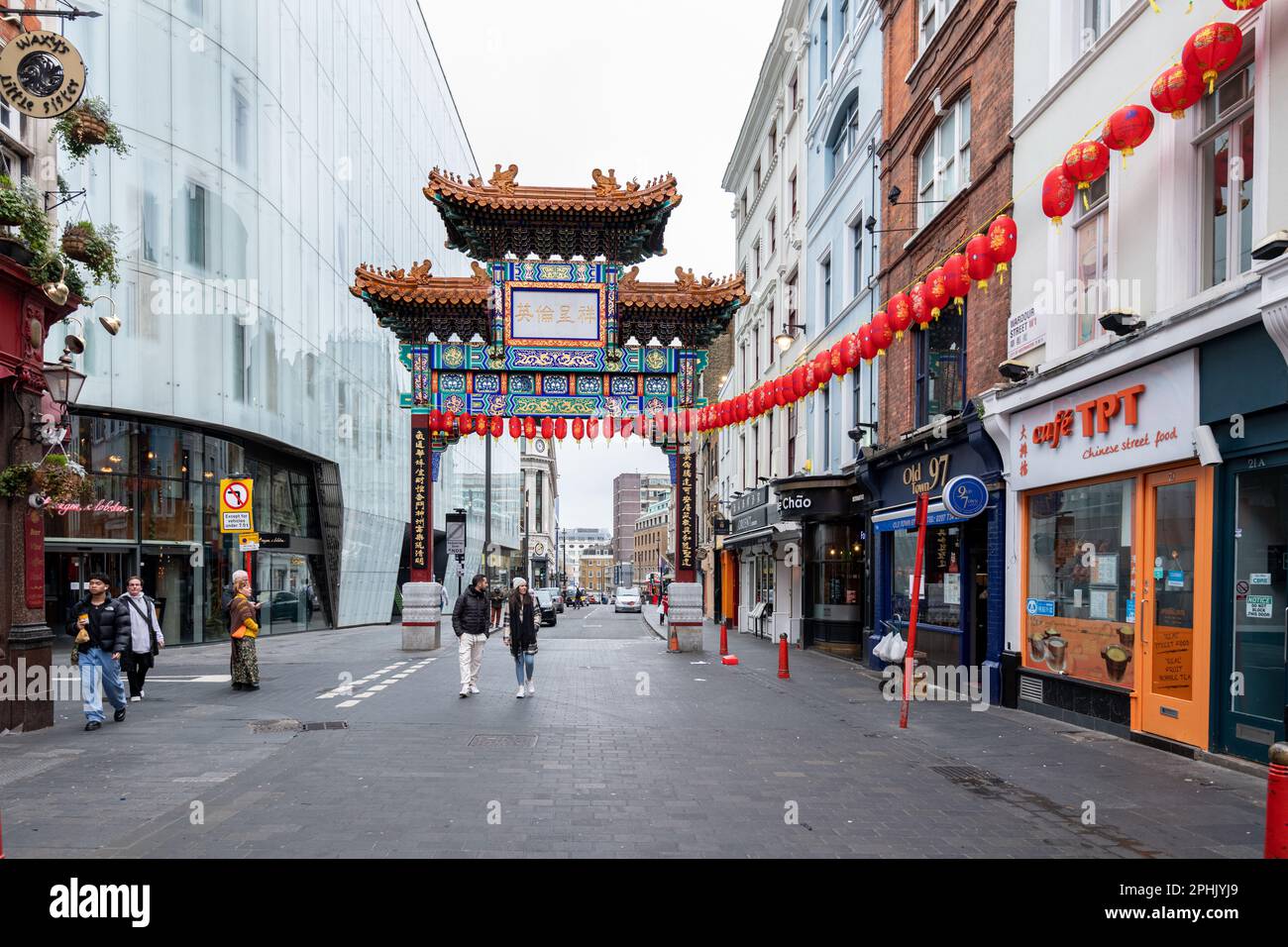 London, UK - February 13, 2023: Undefined people and red double decker ...
