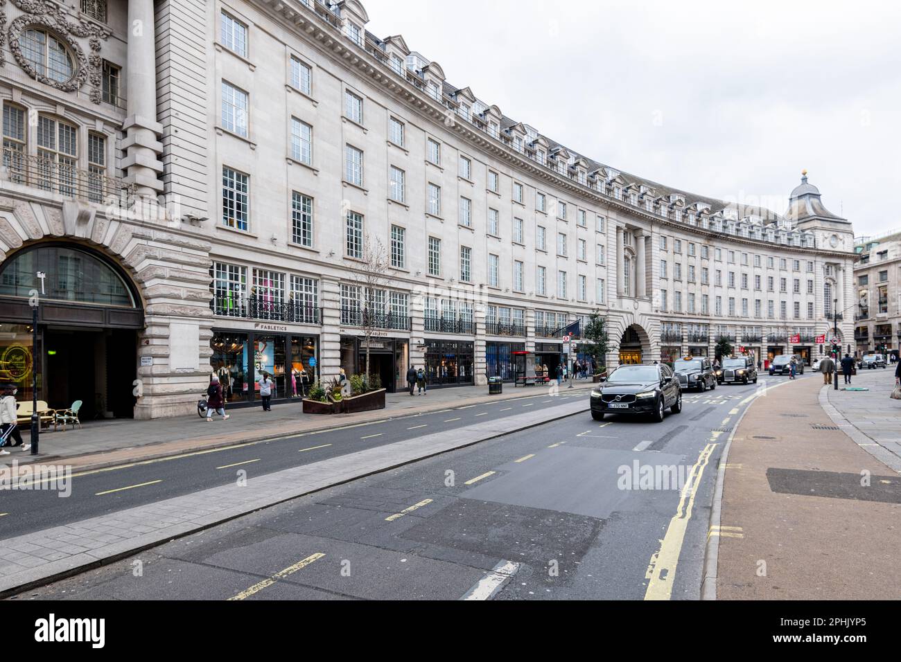 People and traffic in Piccadilly Circus in London. A famous public ...