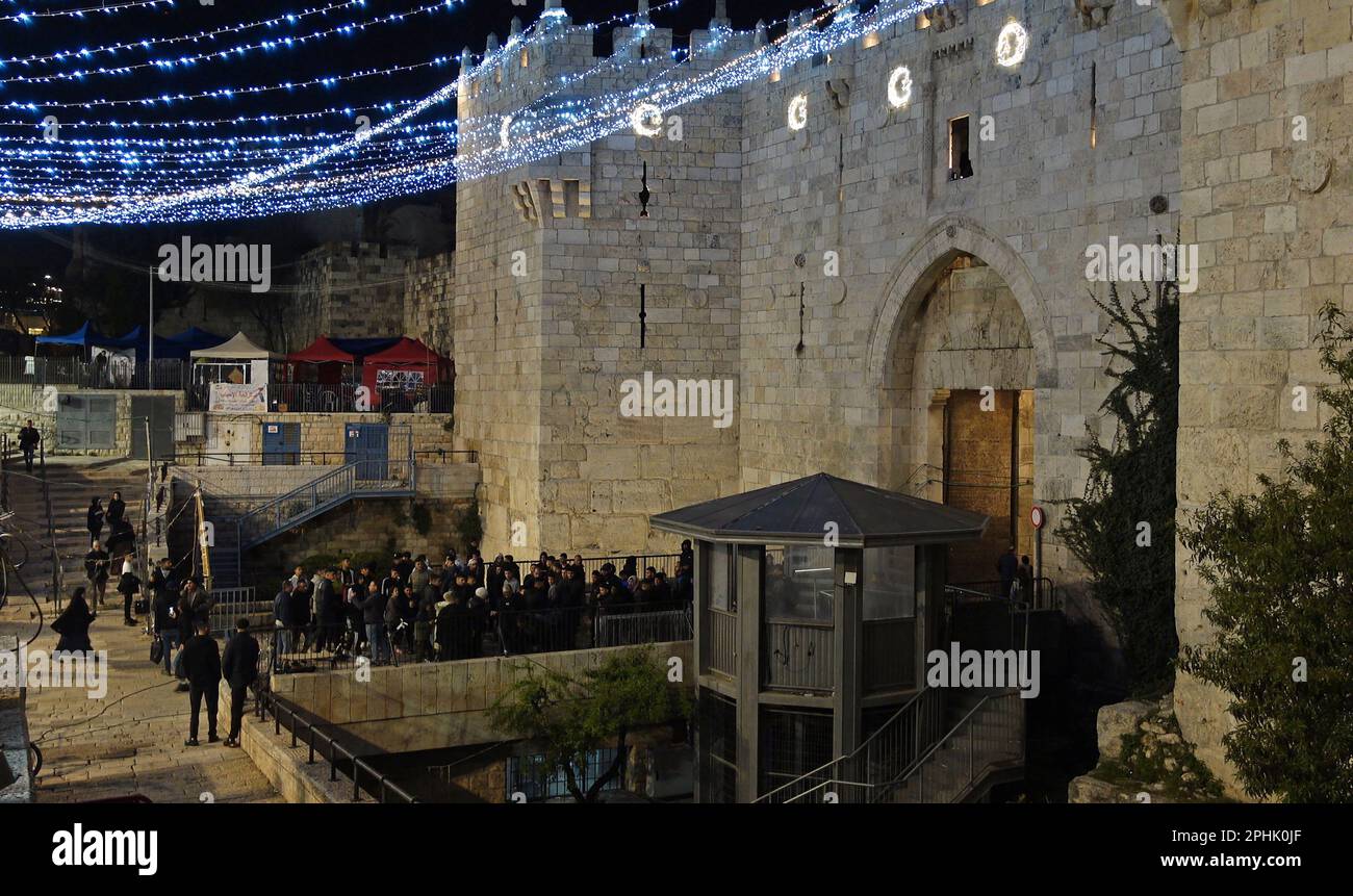 JERUSALEM, ISRAEL - MARCH 26: Festive lights decorate Damascus gate ...