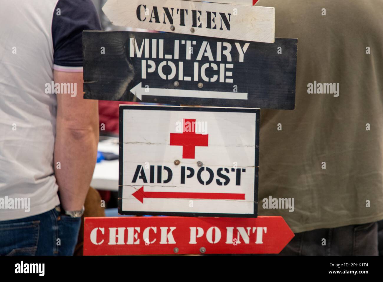 military police and Army Checkpoint sign on wooden panel arrow aid post ...