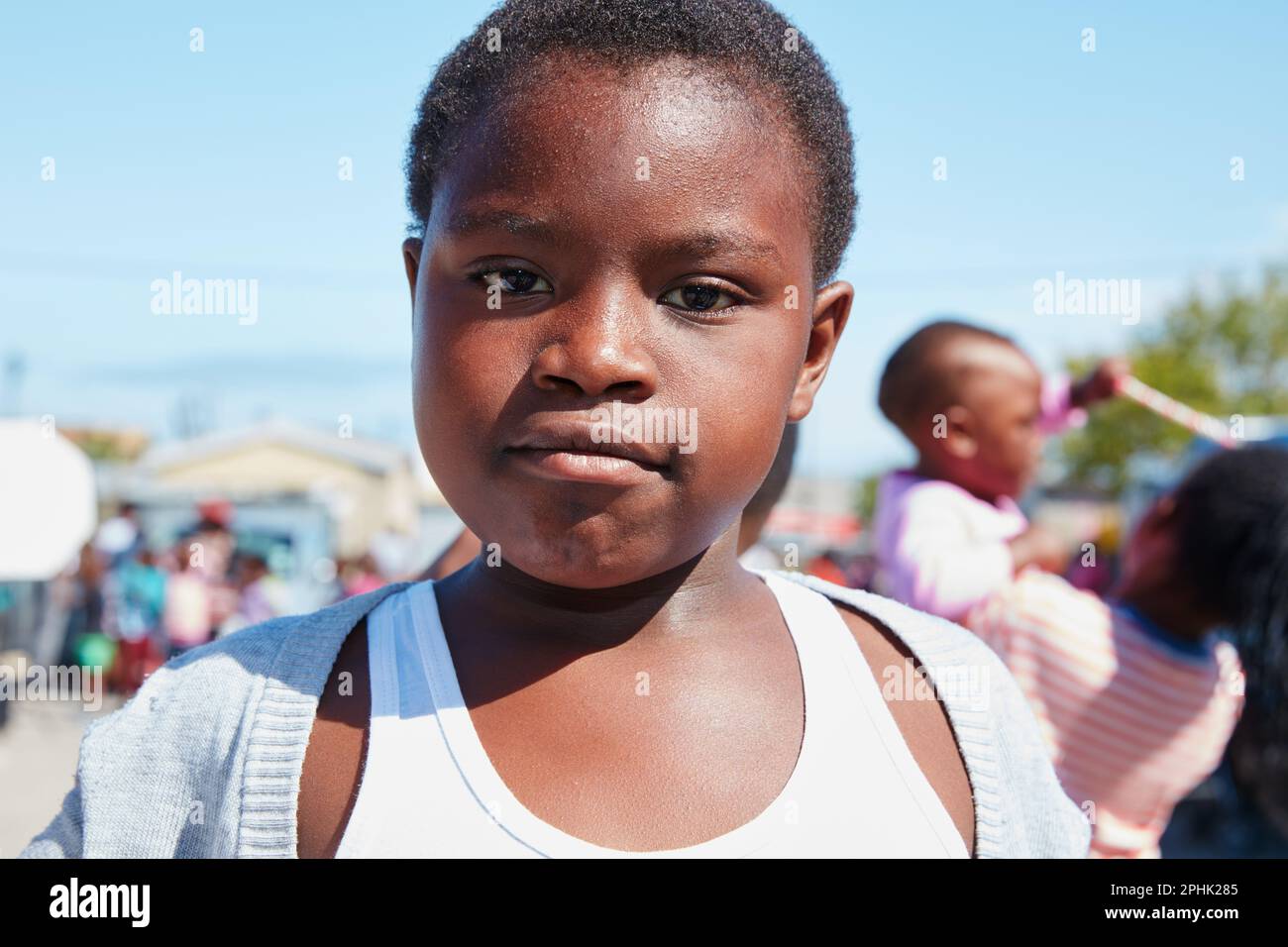 Give her a reason to smile. Cropped portrait of a young child at a ...