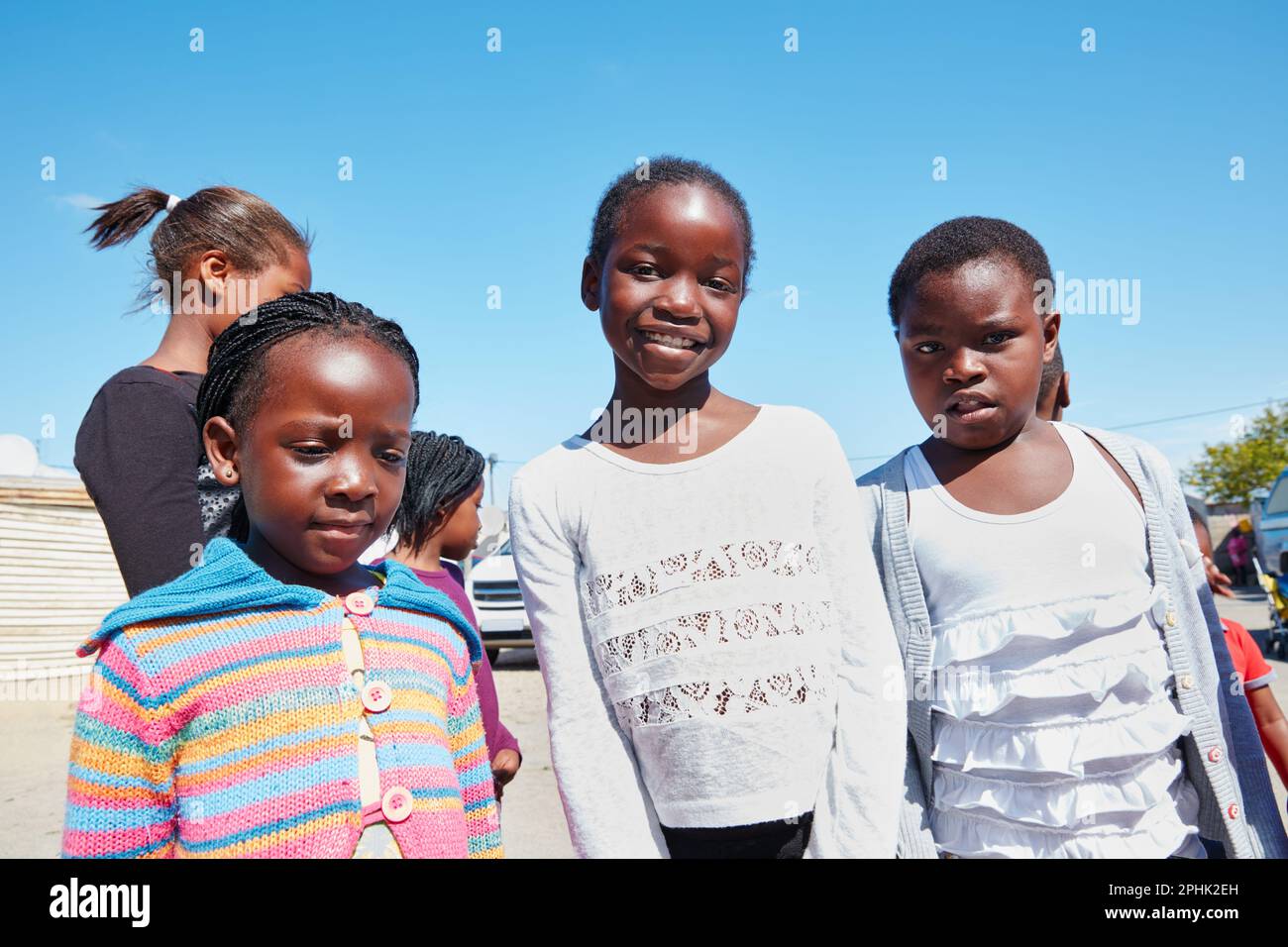 These children need your help. Cropped portrait of a group of kids at a ...