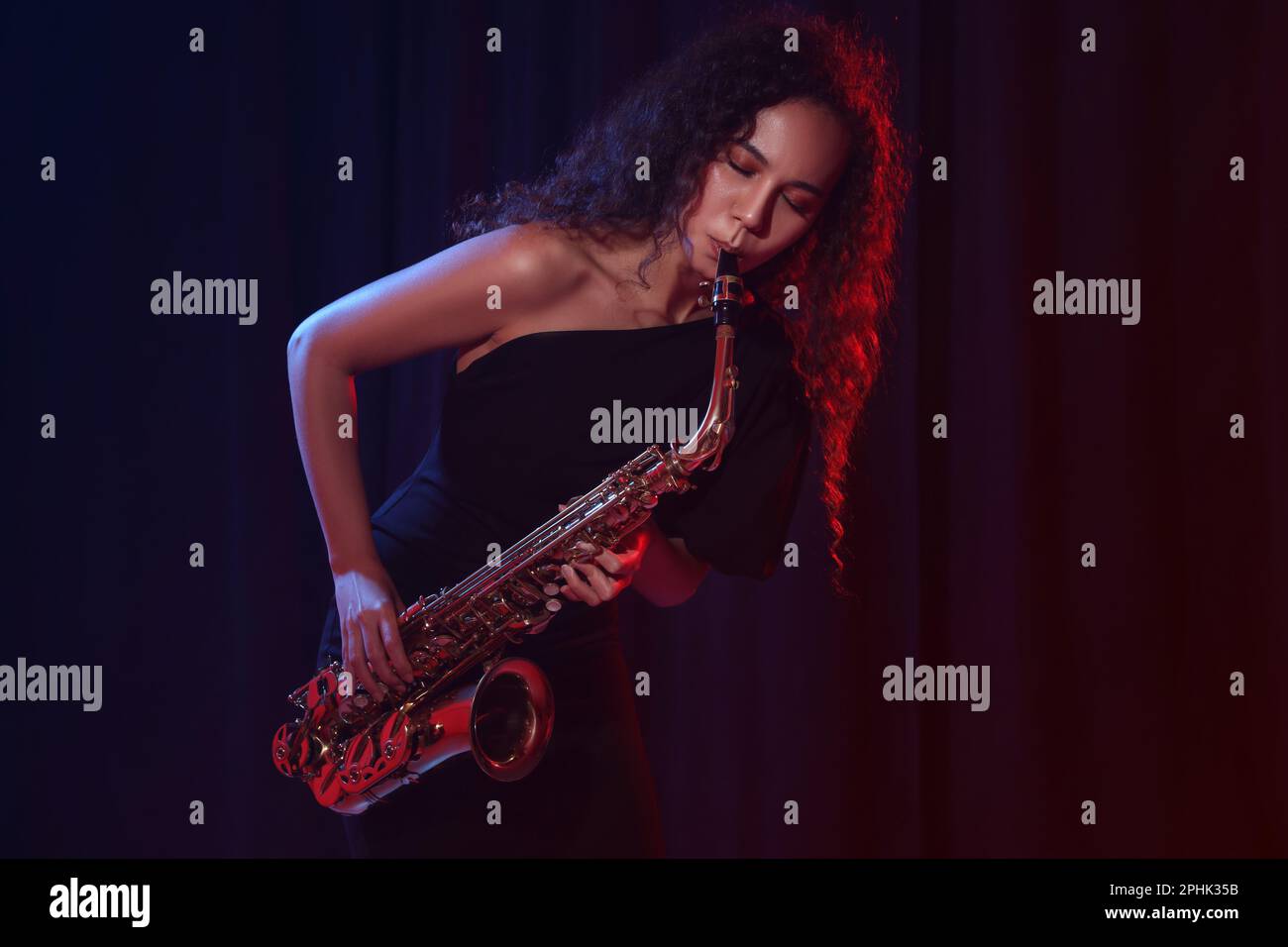 African sax lady hi-res stock photography and images - Alamy