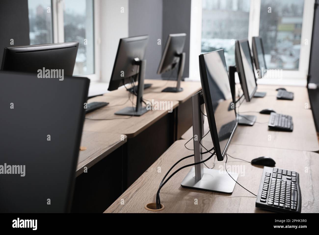 Many modern computers in open space office Stock Photo - Alamy