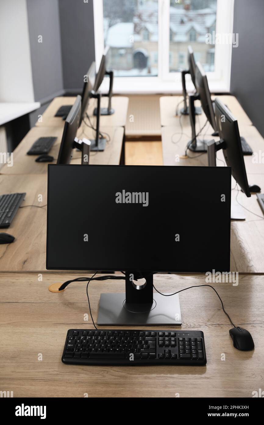 Rows of computers in empty office hi-res stock photography and images ...
