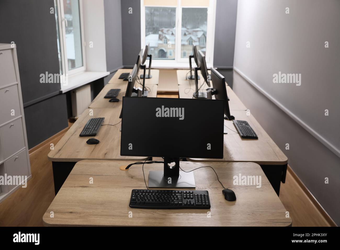 Rows of computers in empty office hi-res stock photography and images ...