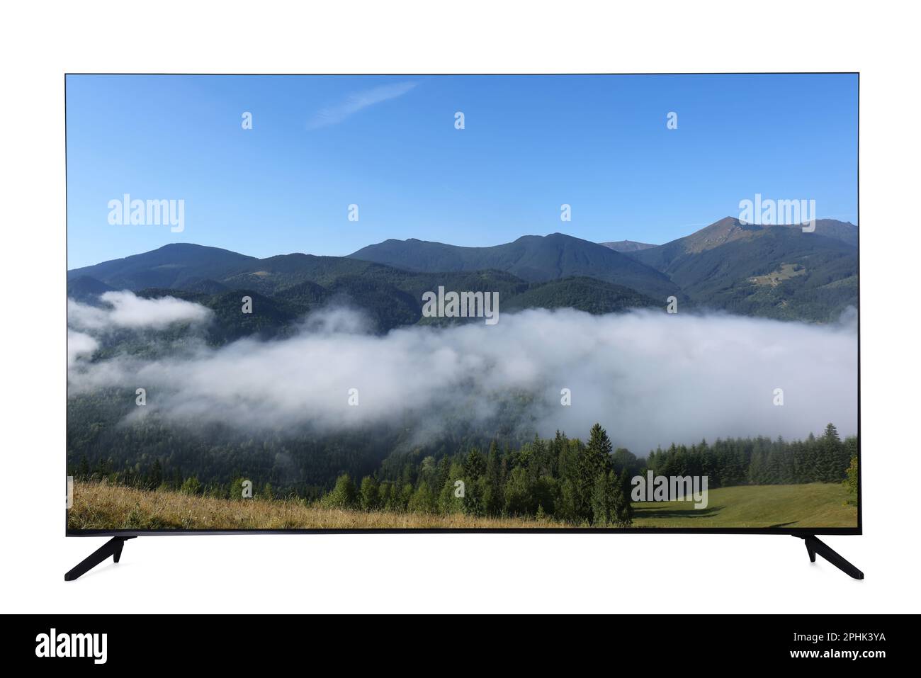 Modern wide screen TV monitor showing beautiful mountain landscape ...