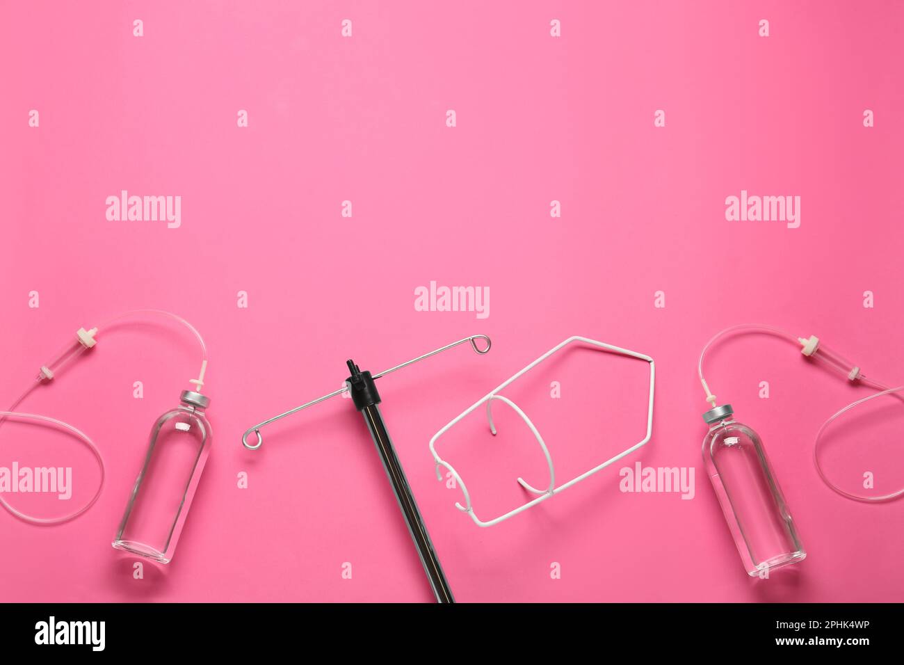 IV infusion set on pink background, flat lay. Space for text Stock ...