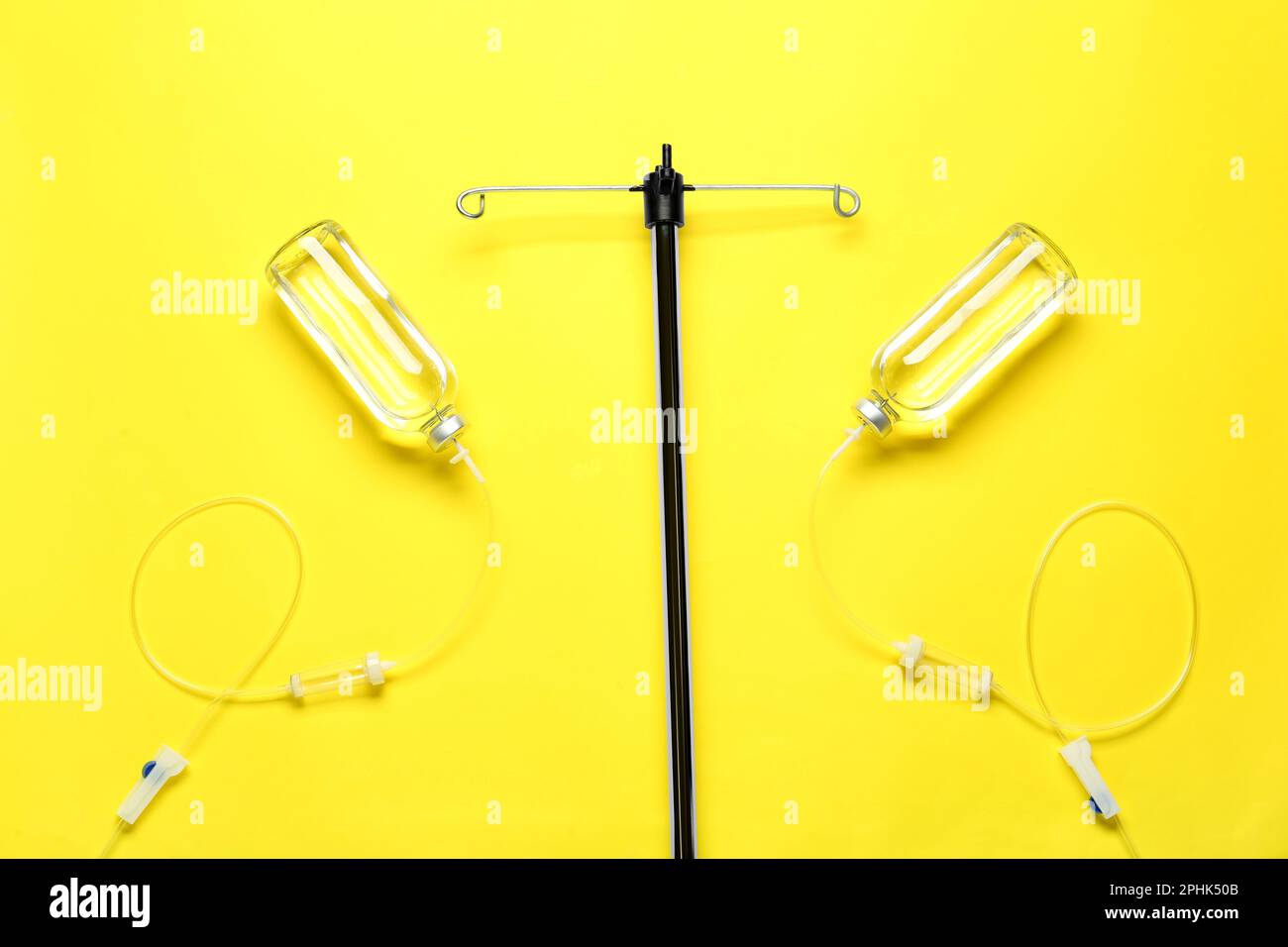 IV infusion set on yellow background, flat lay Stock Photo - Alamy