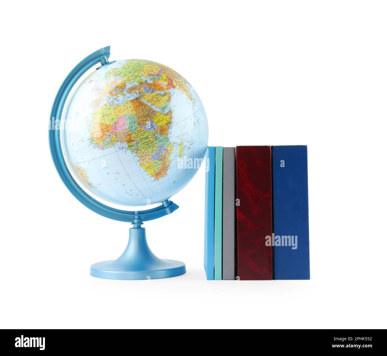 Plastic model globe of Earth and books on white background. Geography ...
