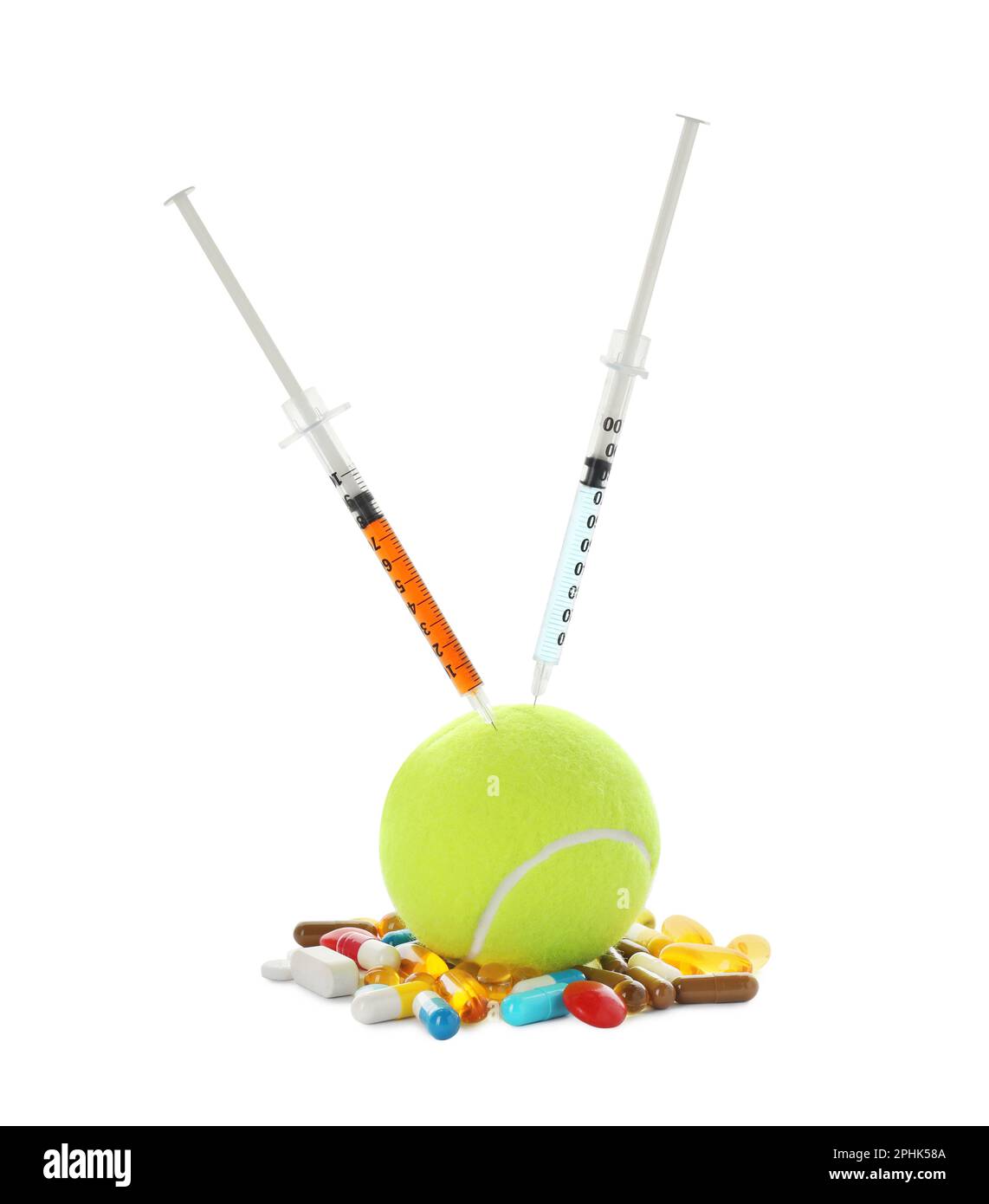 Tennis ball with syringes and different pills on white background ...