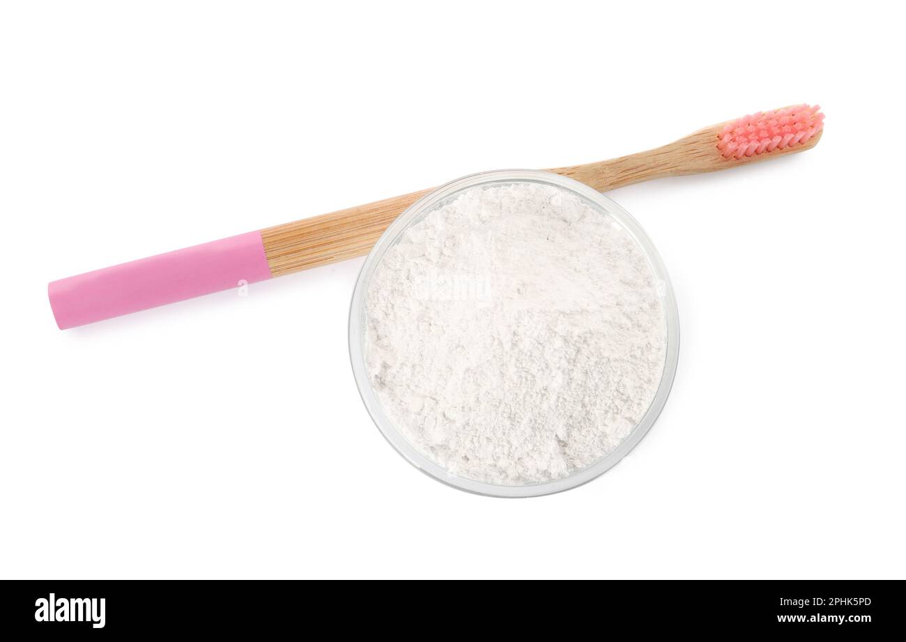 Bowl of tooth powder and brush on white background, top view Stock ...