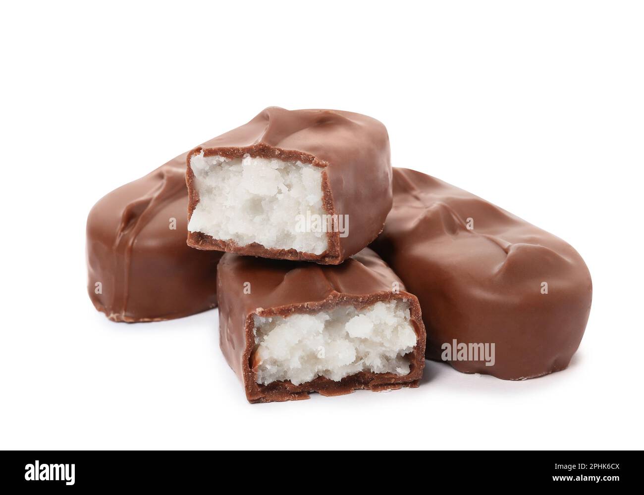 Delicious milk chocolate candy bars with coconut filling on white ...
