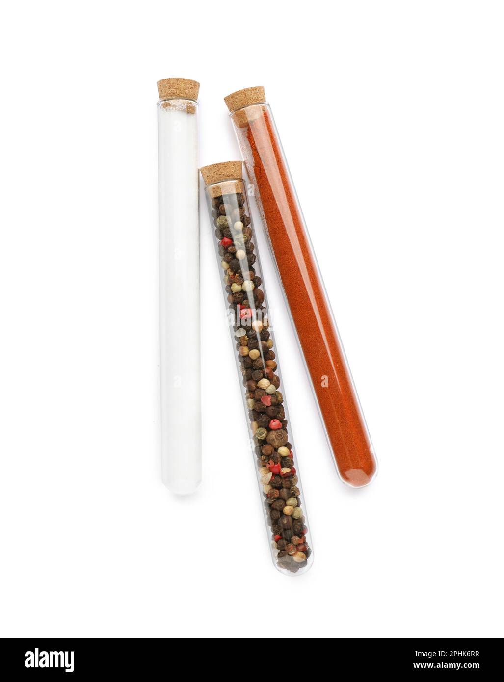 Glass tubes with different spices on white background, top view Stock ...
