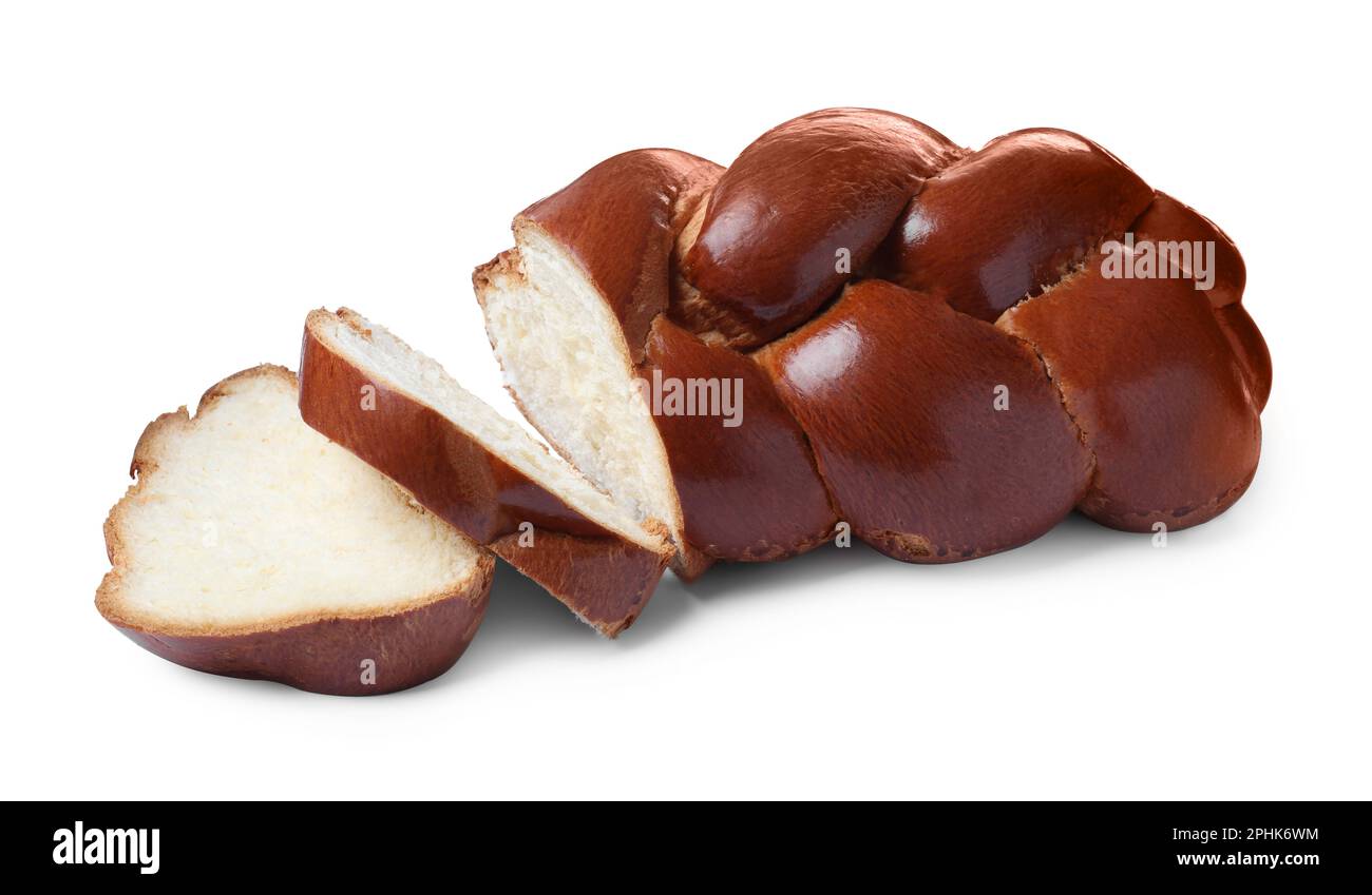 Cut homemade braided bread isolated on white. Traditional Shabbat ...