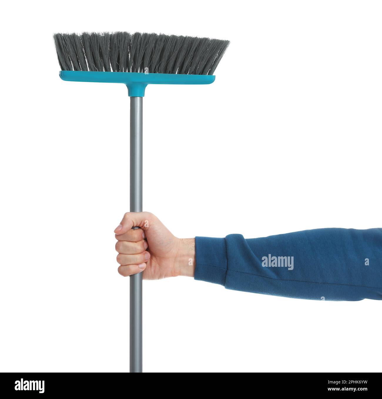 Man holding broom Cut Out Stock Images & Pictures - Alamy