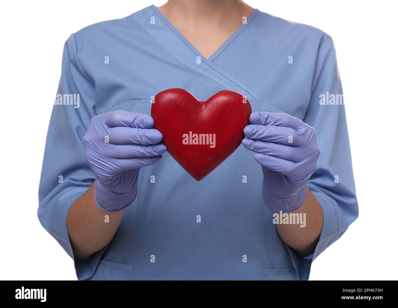Doctor holding red heart on white background, closeup. Cardiology ...