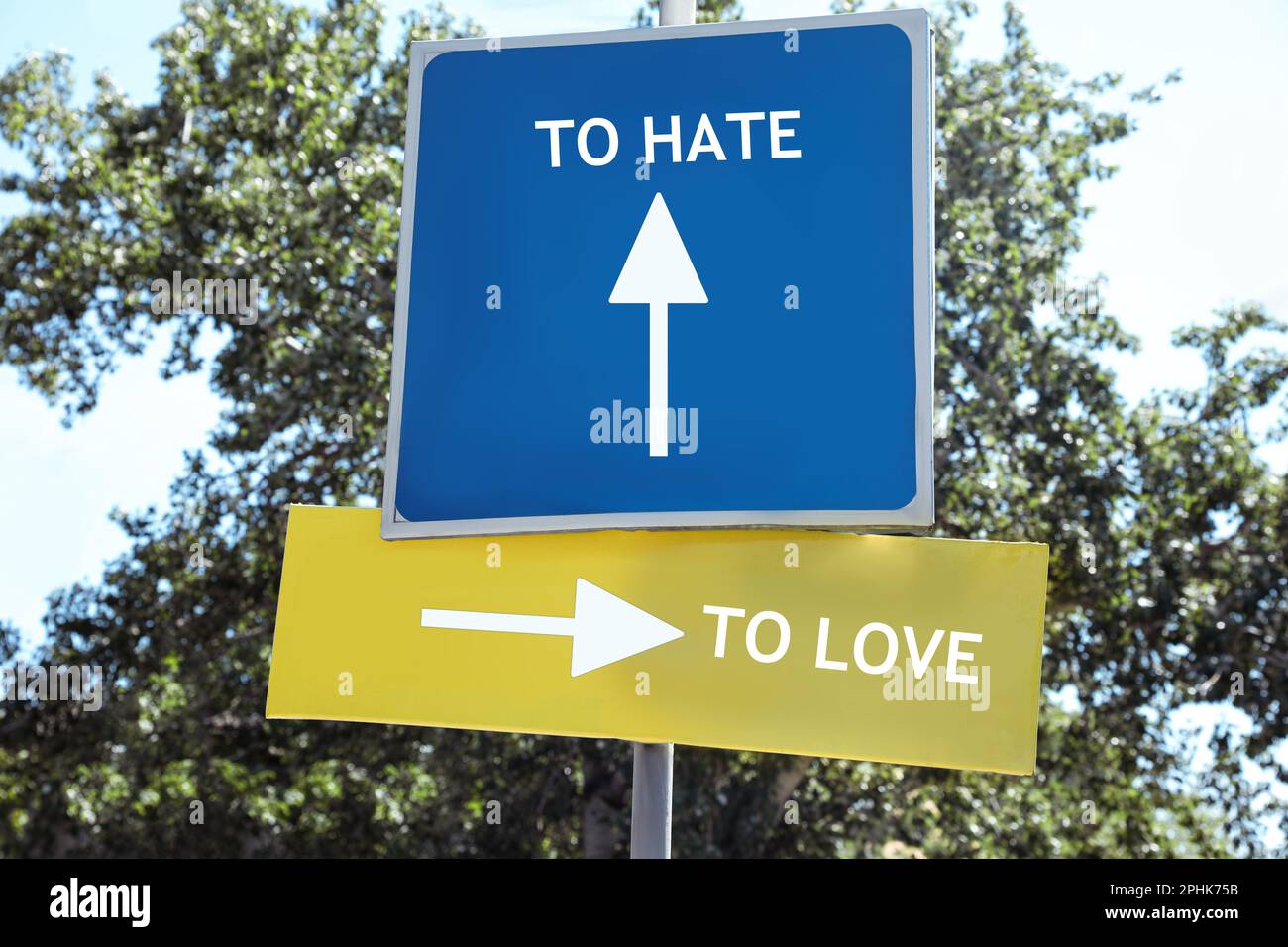 Road signs with different directions - TO HATE or TO LOVE outdoors ...