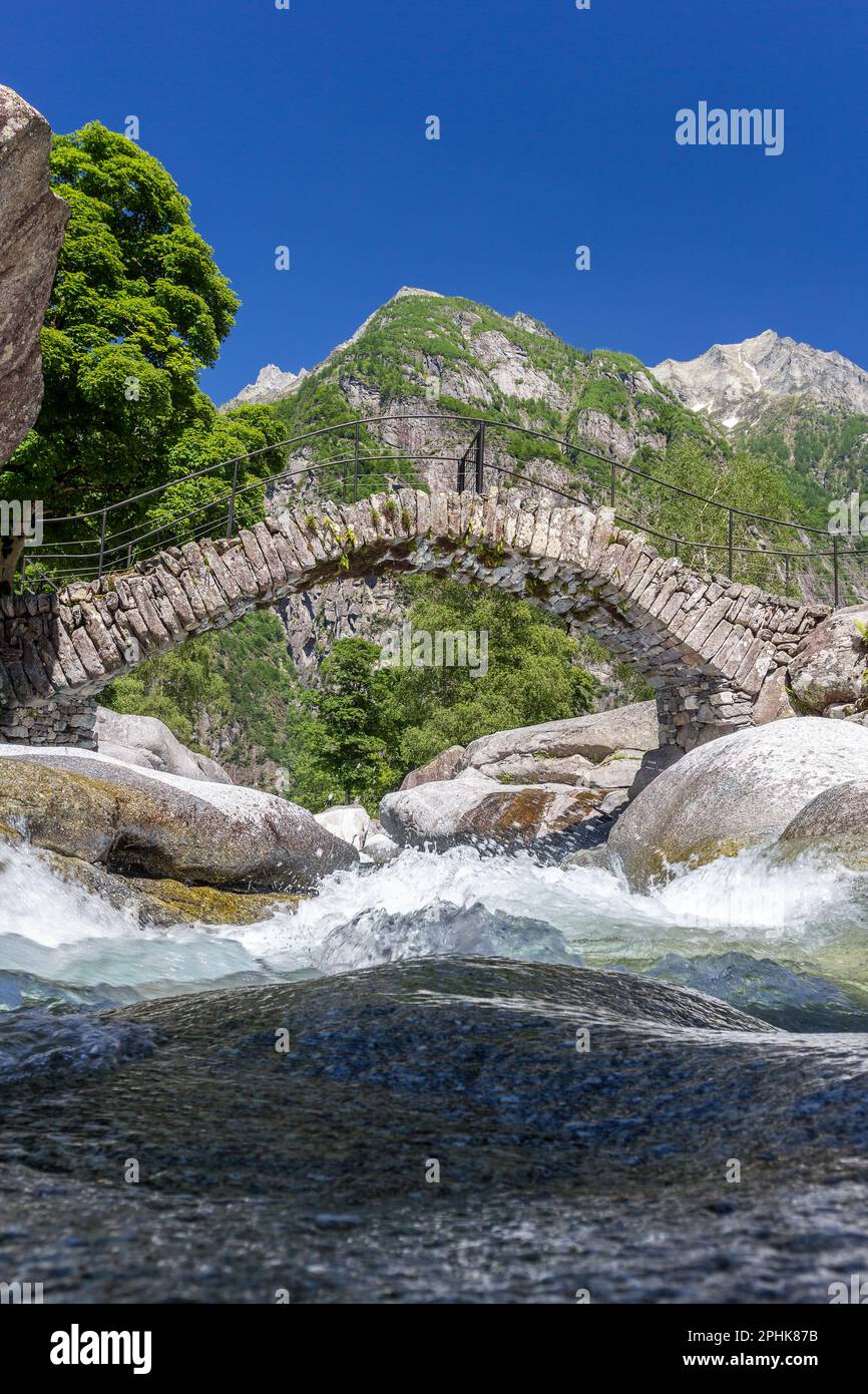 The ancient roman stone bridge at Puntid high over the Foroglio village ...