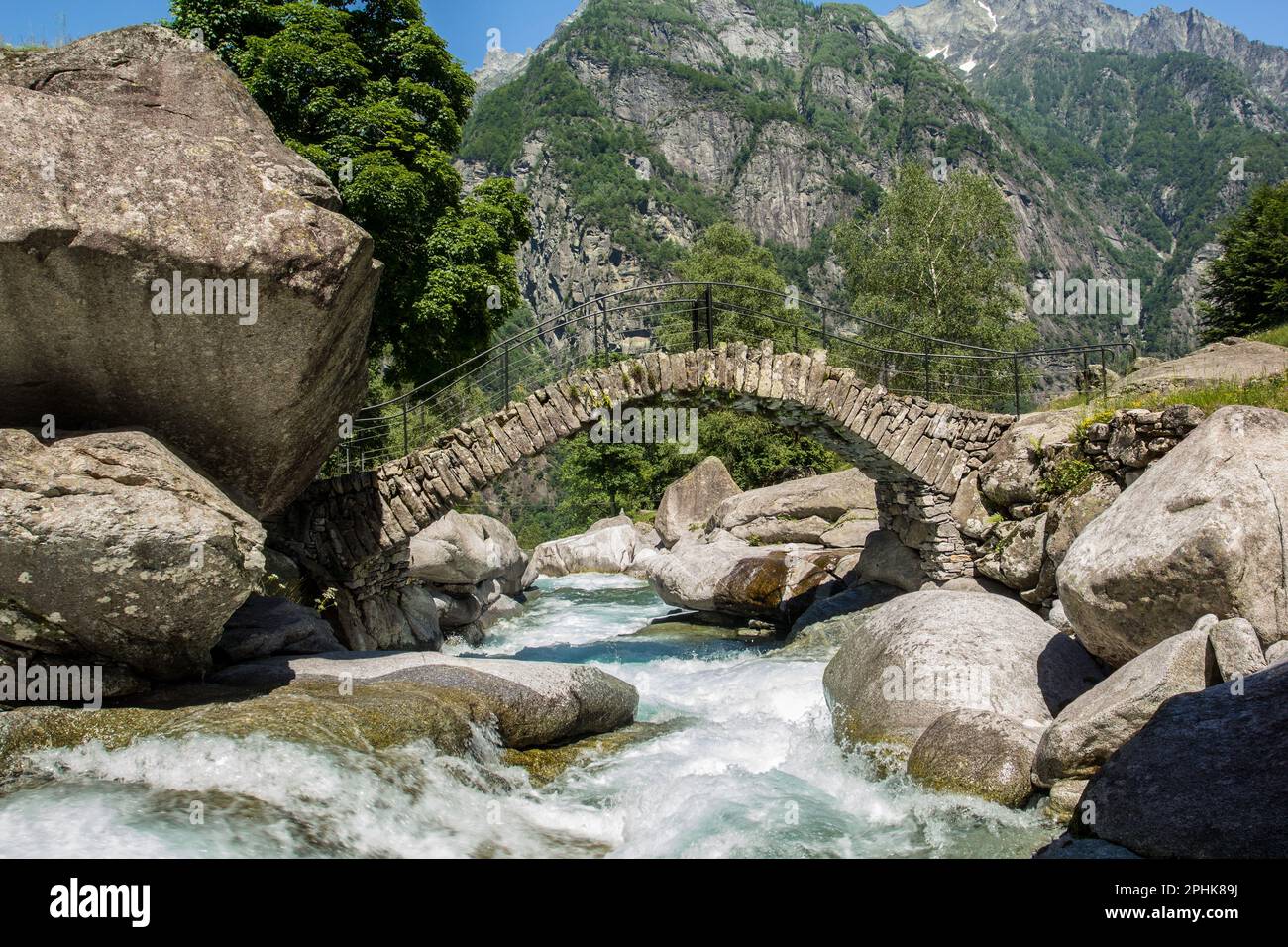 The ancient roman stone bridge at Puntid high over the Foroglio village ...