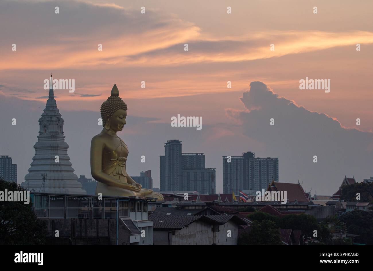 aerial view golden big Buddha Wat Paknam Phasi Charoen in sunset ...