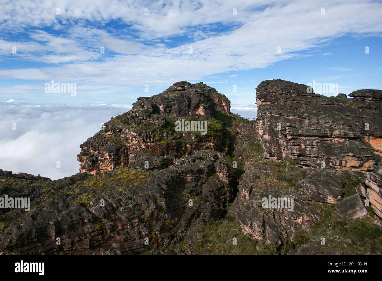 Steep and eroded sandstone cliffs of Auyan tepui, a famous table ...