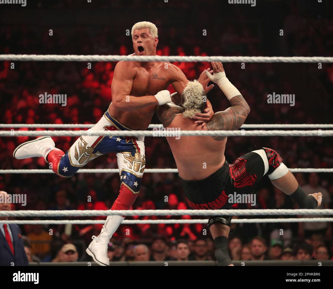 PHOENIX, ARIZONA - MARCH 27: (L-R) Cody Rhodes fights Solo Sikoa during ...