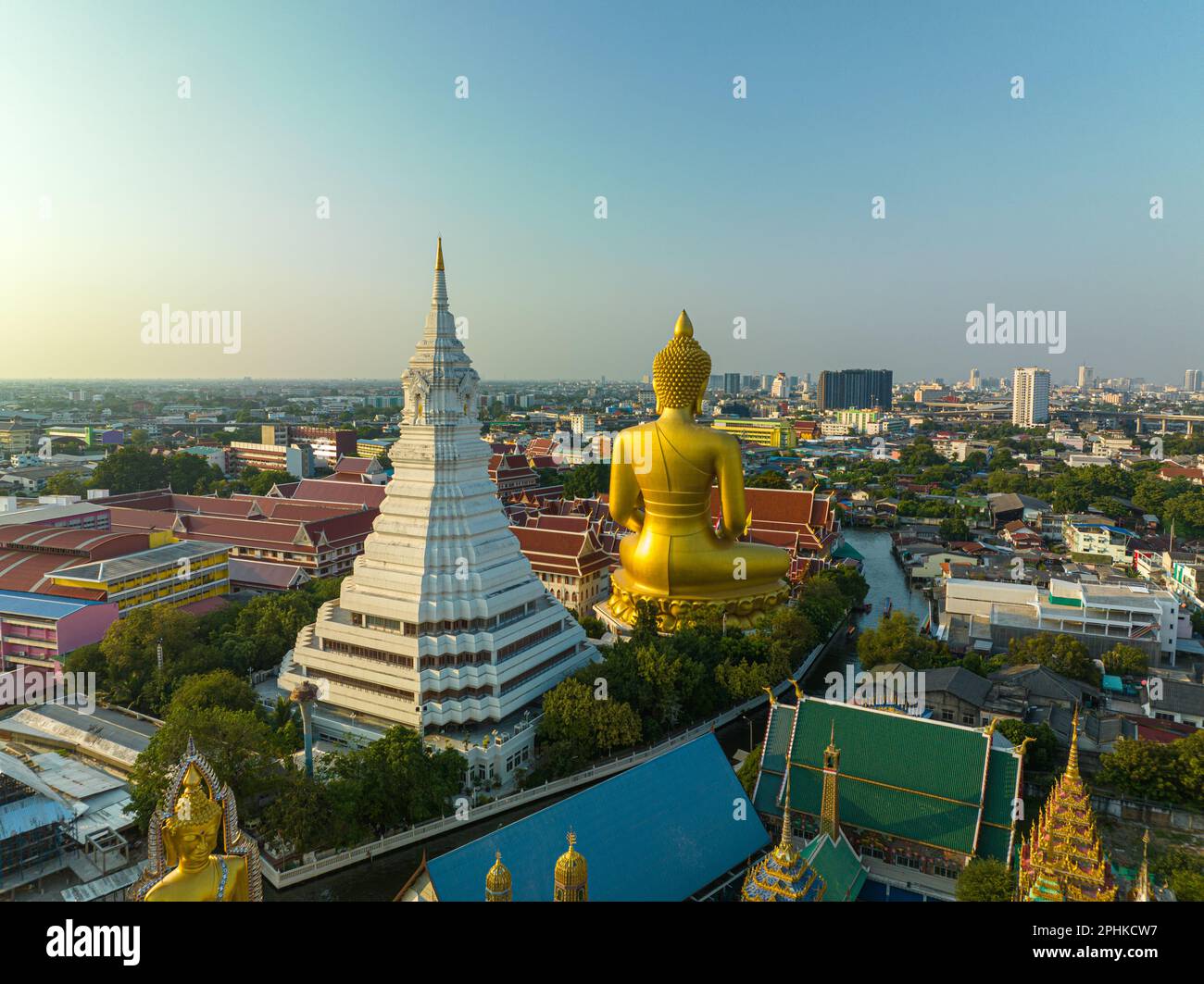 aerial view golden big Buddha Wat Paknam Phasi Charoen in sunset ...