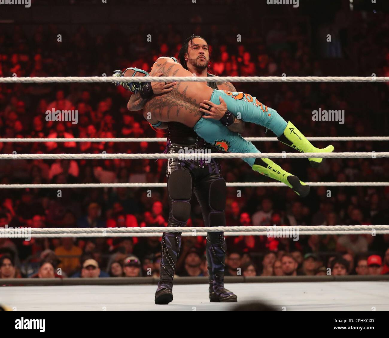 PHOENIX, ARIZONA - MARCH 27: Damian Priest holds Rey Mysterio in the ...