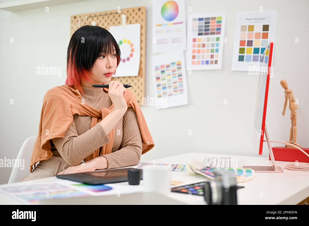 Talented and inspired young Asian female graphic designer focusing on ...