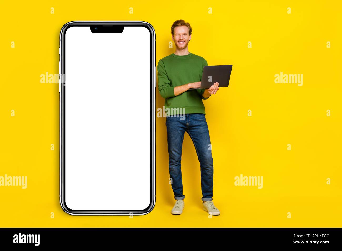 Full length photo of pretty cute guy dressed sweater typing modern ...