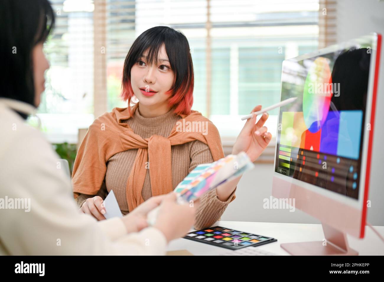 Talented asian female designer hi-res stock photography and images - Alamy