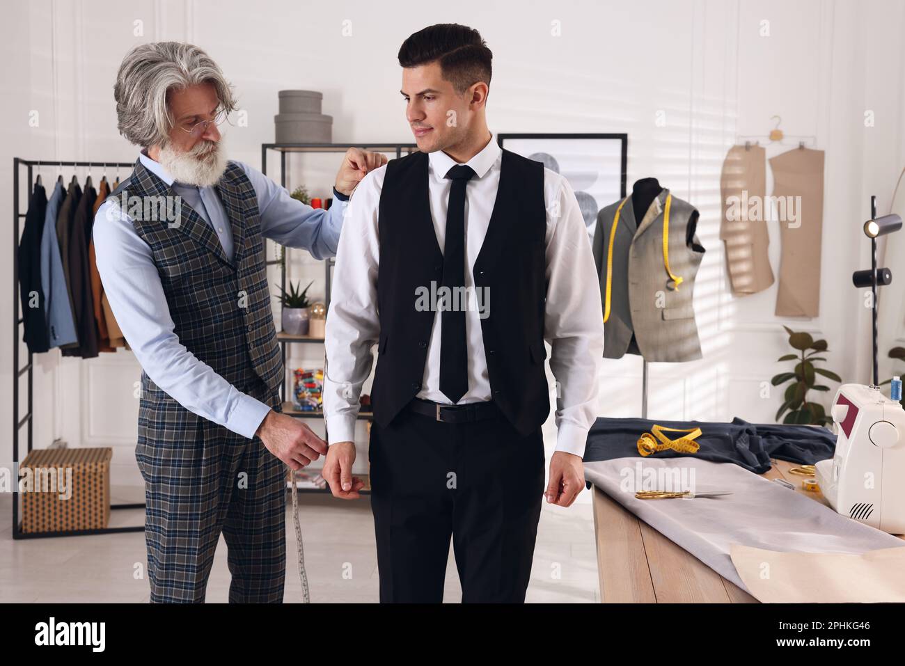 Dressmaker working client in hi-res stock photography and images - Alamy