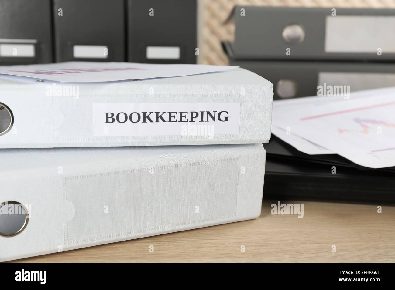 Folders and documents on desk in office, closeup. Bookkeeper's ...