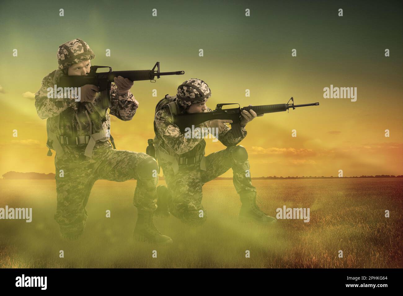 Soldiers with machine guns on battlefield. War conflict Stock Photo - Alamy