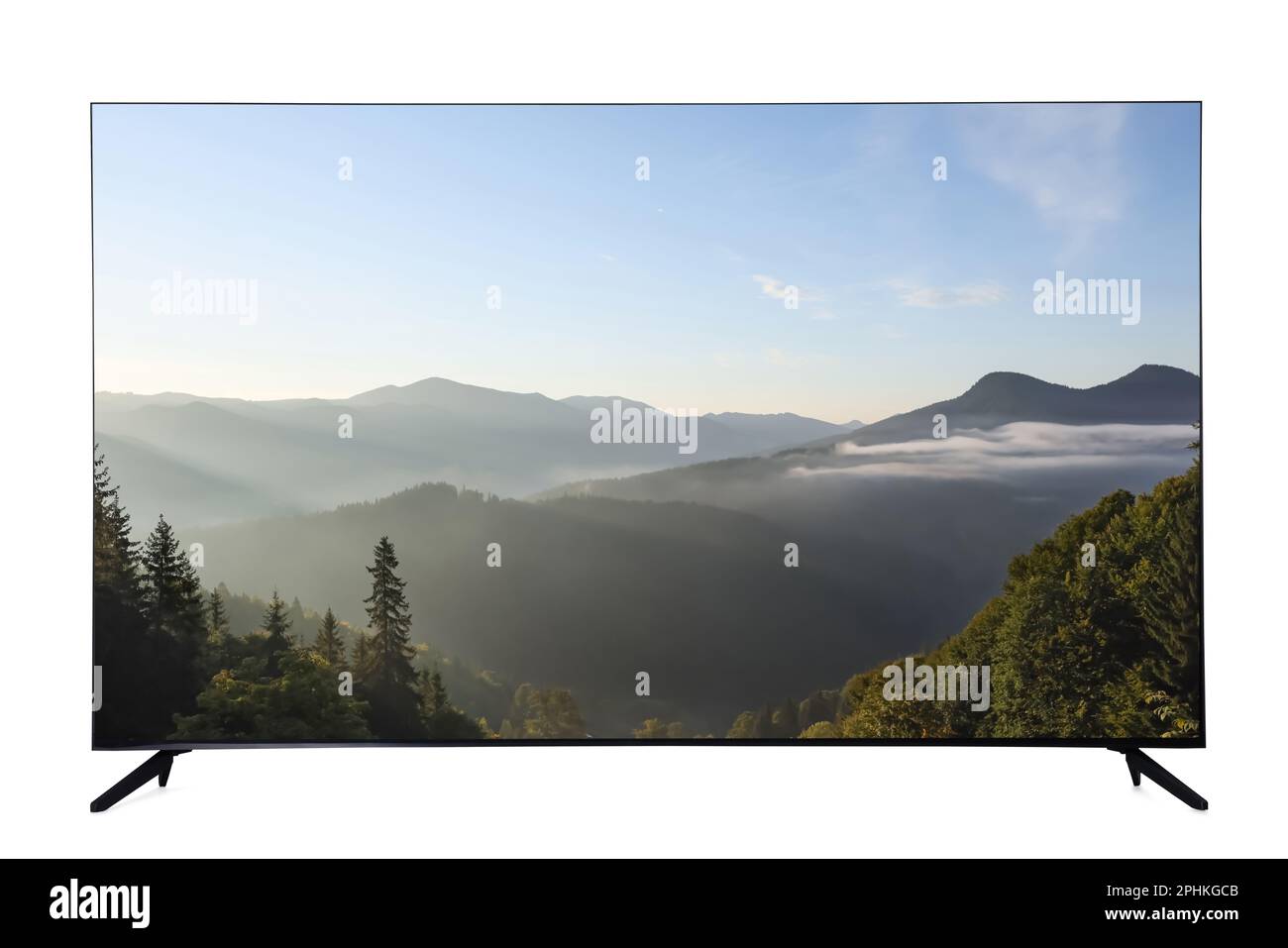 Modern wide screen TV monitor showing beautiful mountain landscape ...